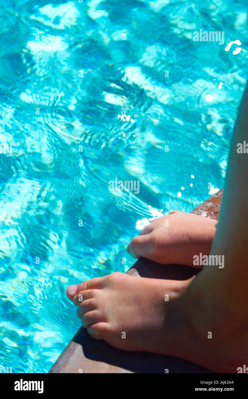 feet by pool Stock Photo - Alamy