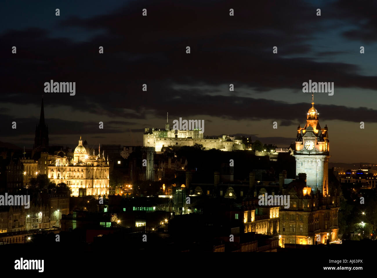 A nighttime Edinburgh cityscape showing Edinburgh Castle the Balmoral ...