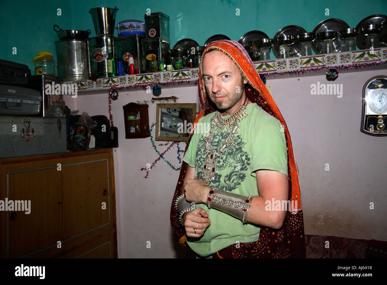 Western male dressed up in local tribal clothing, Ludia Village, nr ...