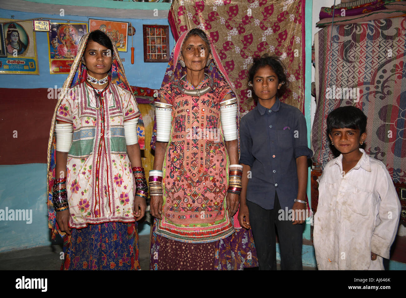 Harijan tribal females with extensive arm bangles posing in their ...