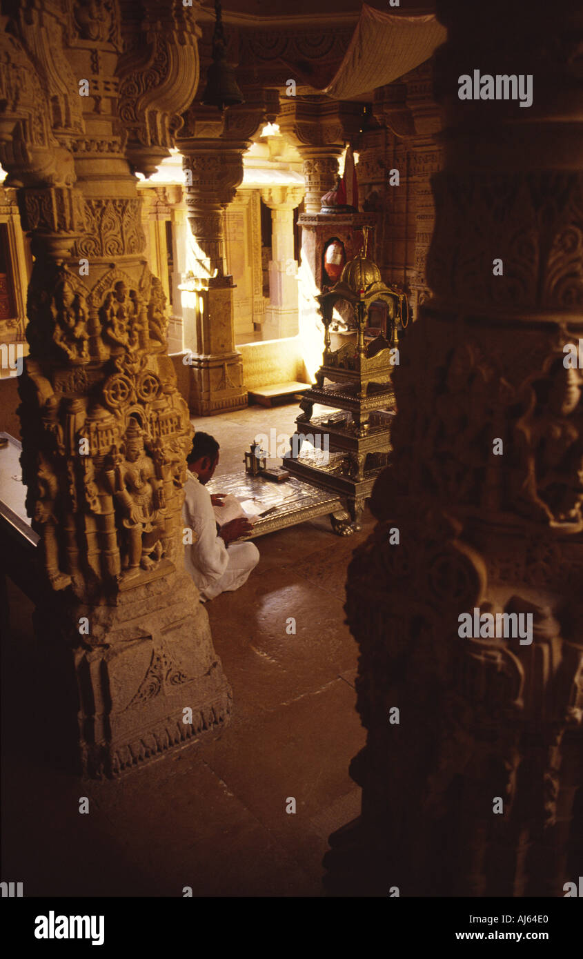 Man praying in a Jain temple in Jaisalmer, Rajasthan, India Stock Photo ...