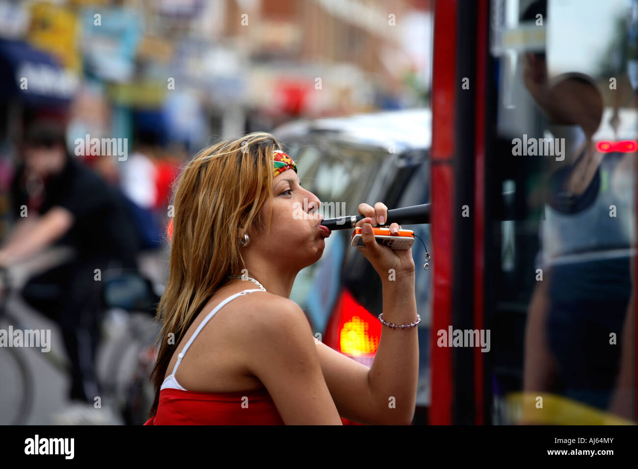 Portuguese football fan blows horn at bus after victory, Portugal vs ...