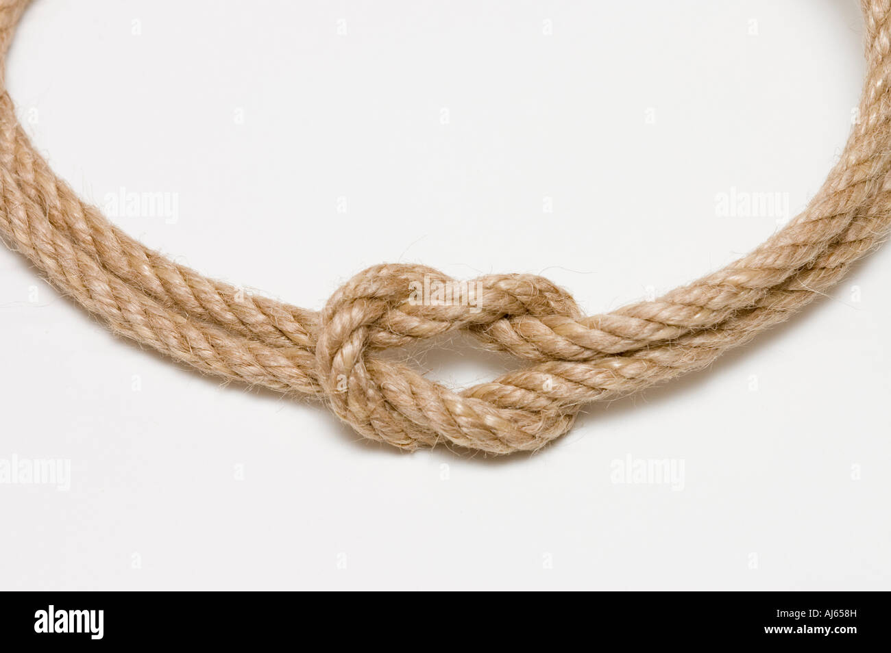 detail of the reef knot on natural rope Stock Photo - Alamy
