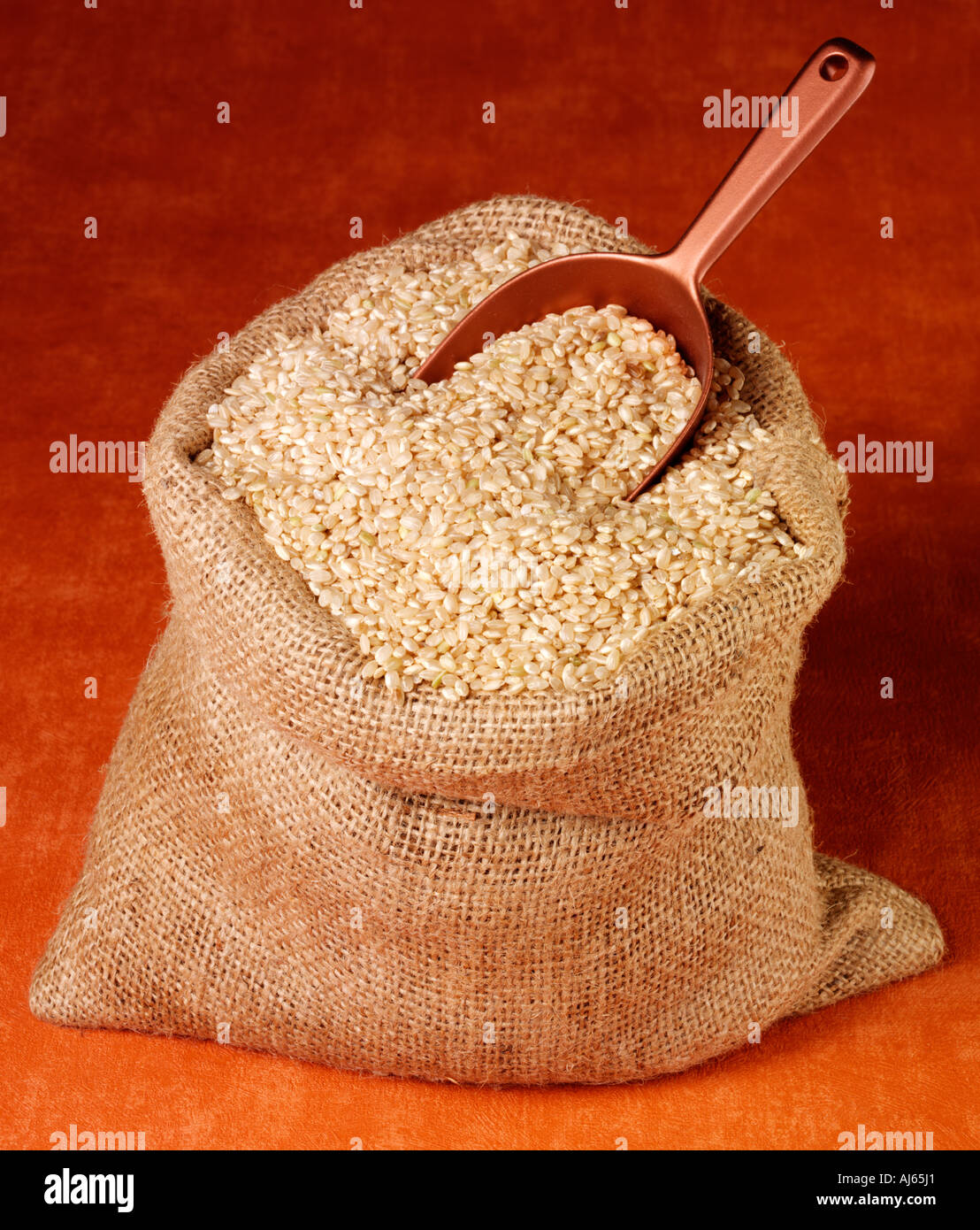 SACK OF BROWN RICE Stock Photo - Alamy
