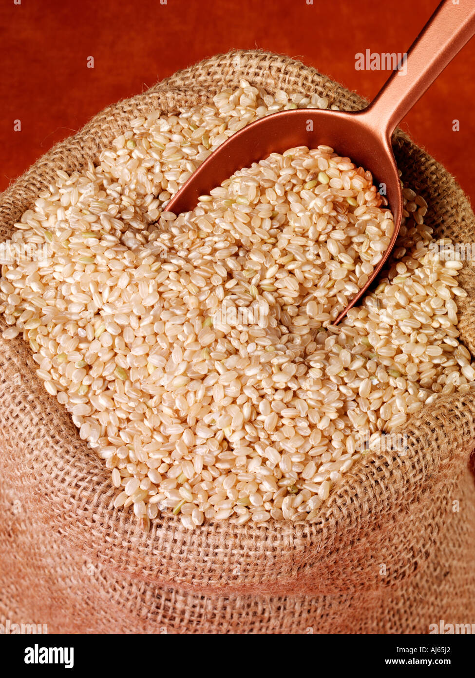 SACK OF BROWN RICE Stock Photo - Alamy