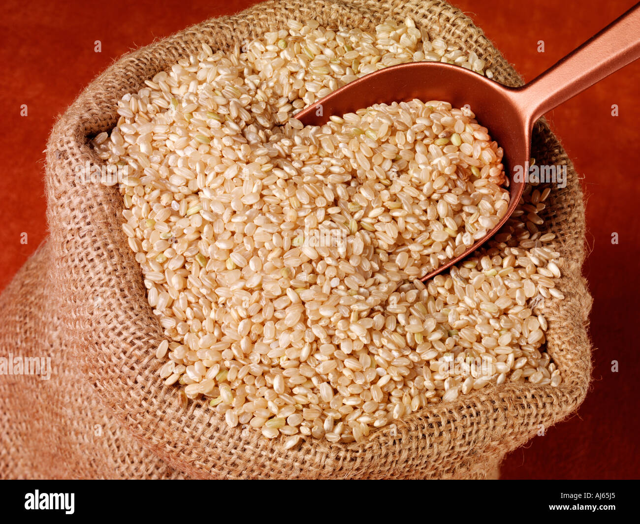 SACK OF BROWN RICE Stock Photo - Alamy