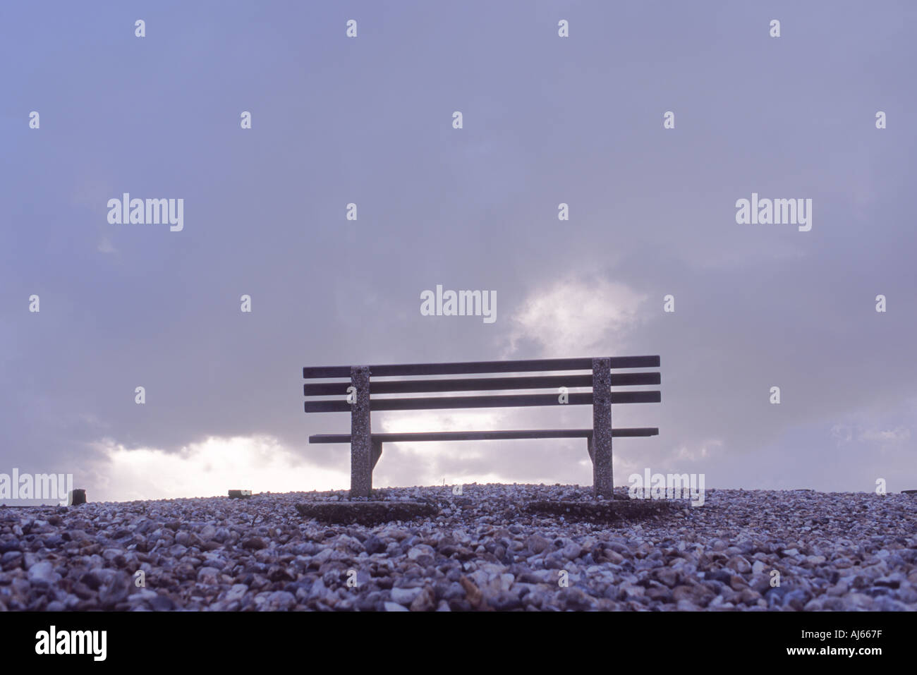 Bench On Beach in Profile Stock Photo - Alamy