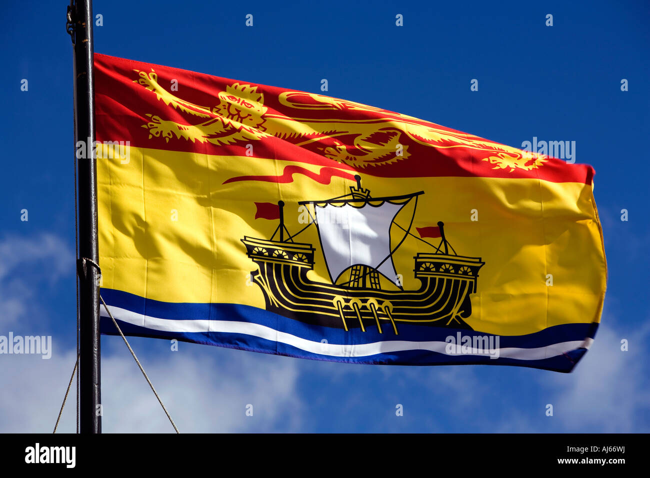 UK Kent Deal colourful flag flying in blue sky above beach hut Stock ...