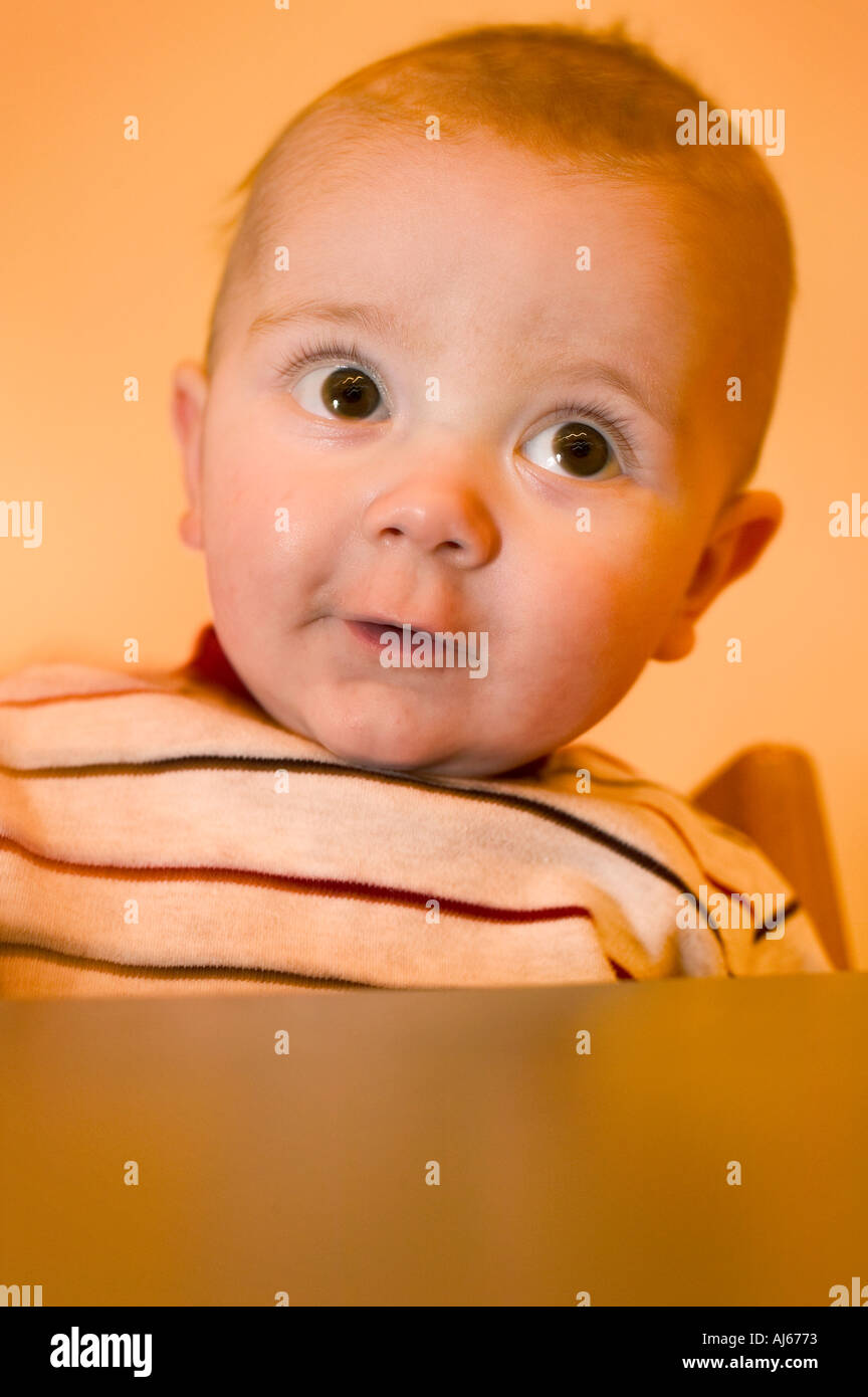8 month old baby looking amused Stock Photo - Alamy