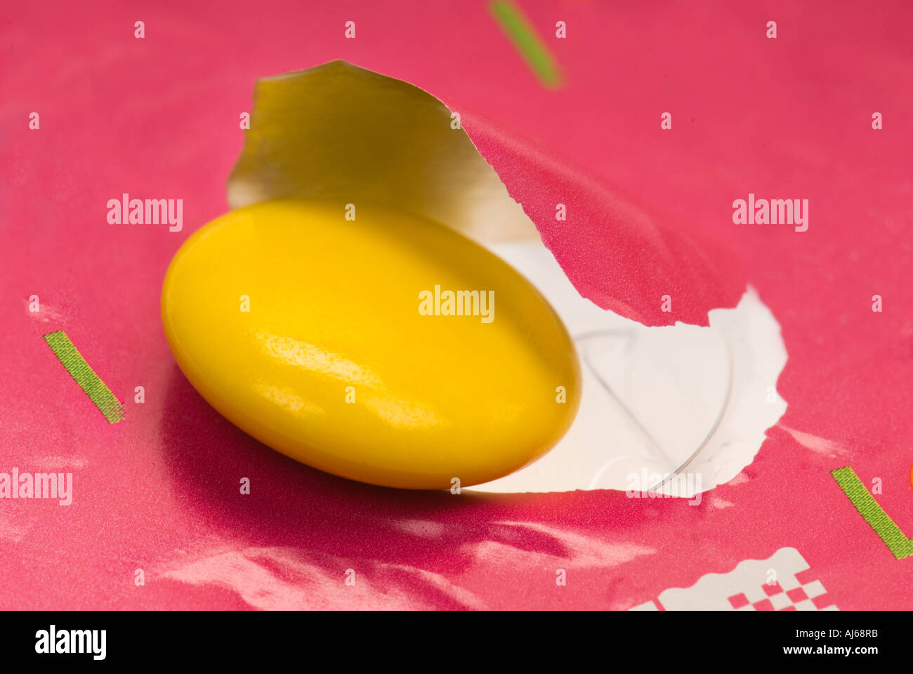 a one 1 yellow colored coloured pill tab in blister pack tablet troche ...