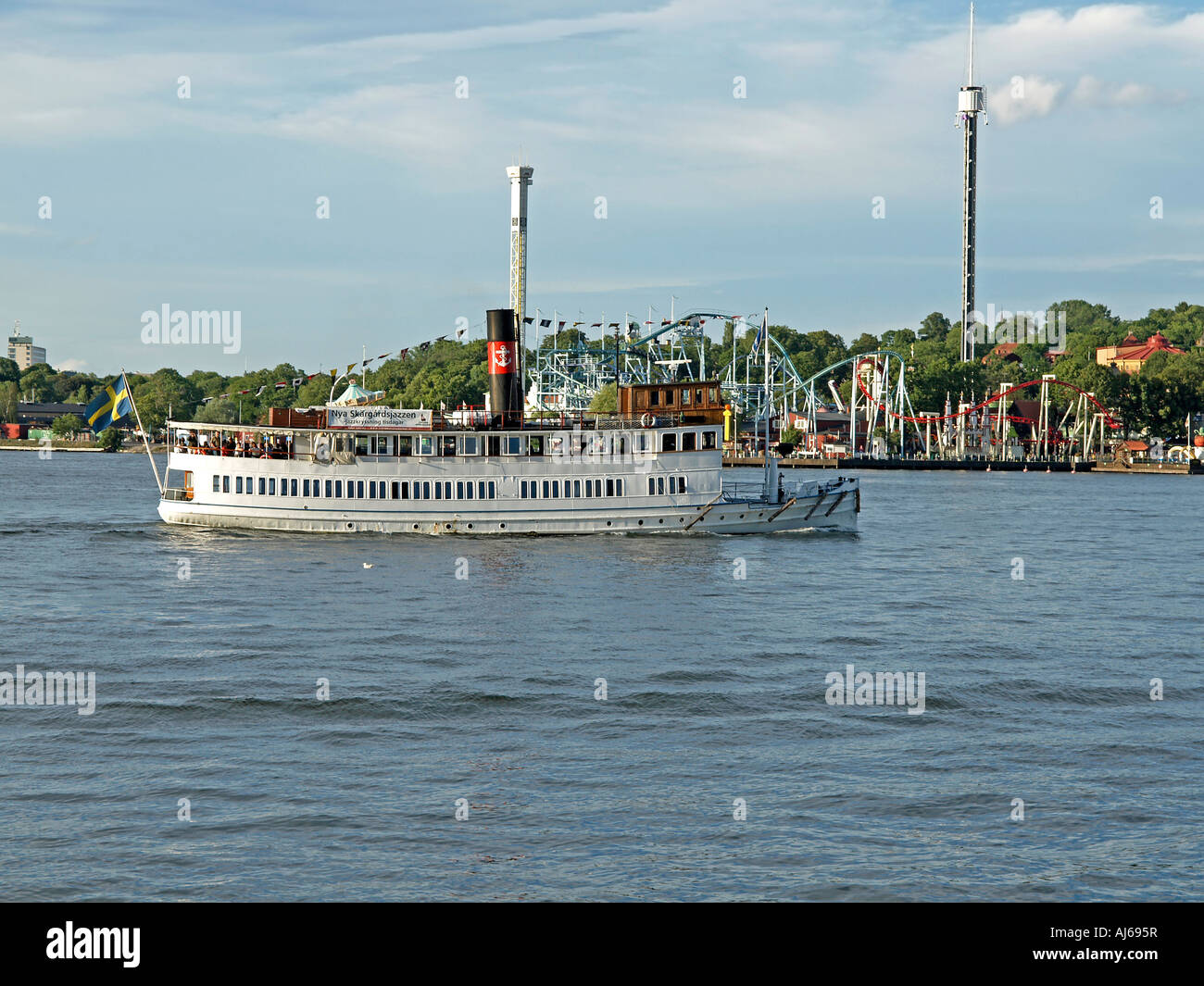 old steam boat in front of the amusement park Skansen on the shore of ...