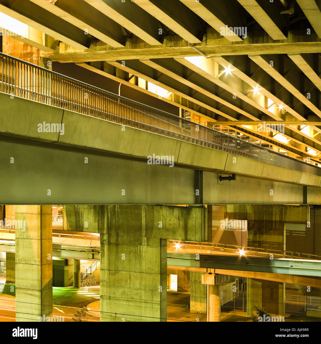 Under overhead highway at night Stock Photo - Alamy