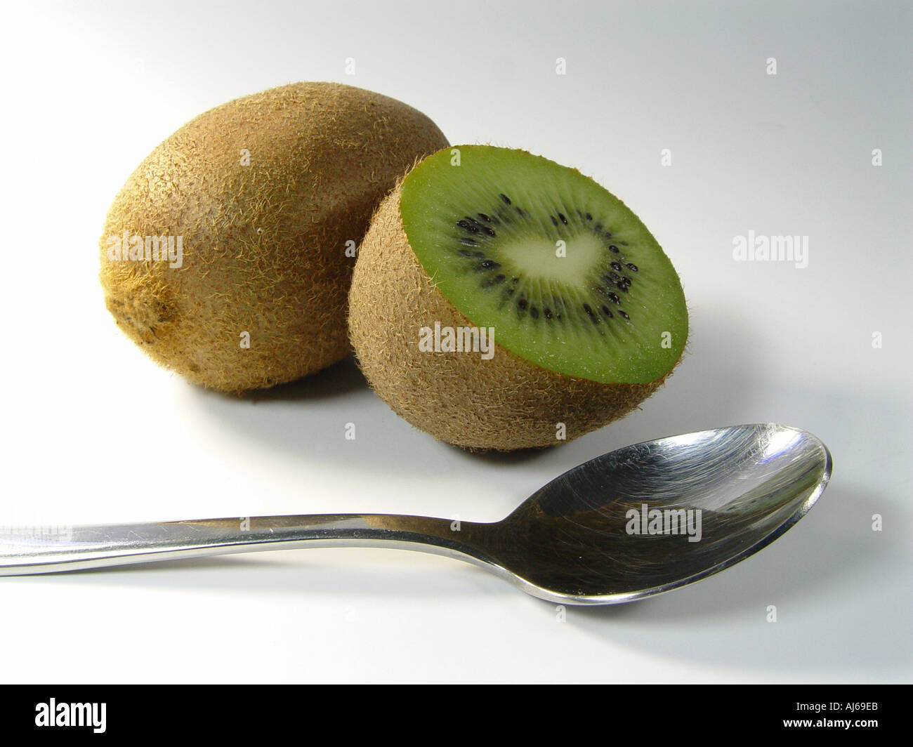 kiwi with spoon Symbol for the meal of vitamine and or a Kiwidiet Stock ...