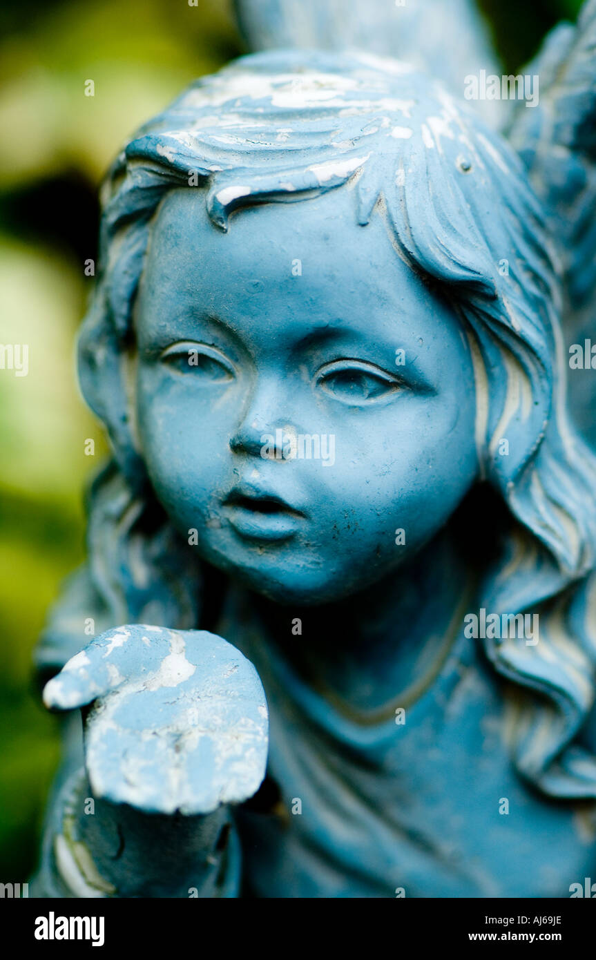 Blue cherub statue Stock Photo - Alamy