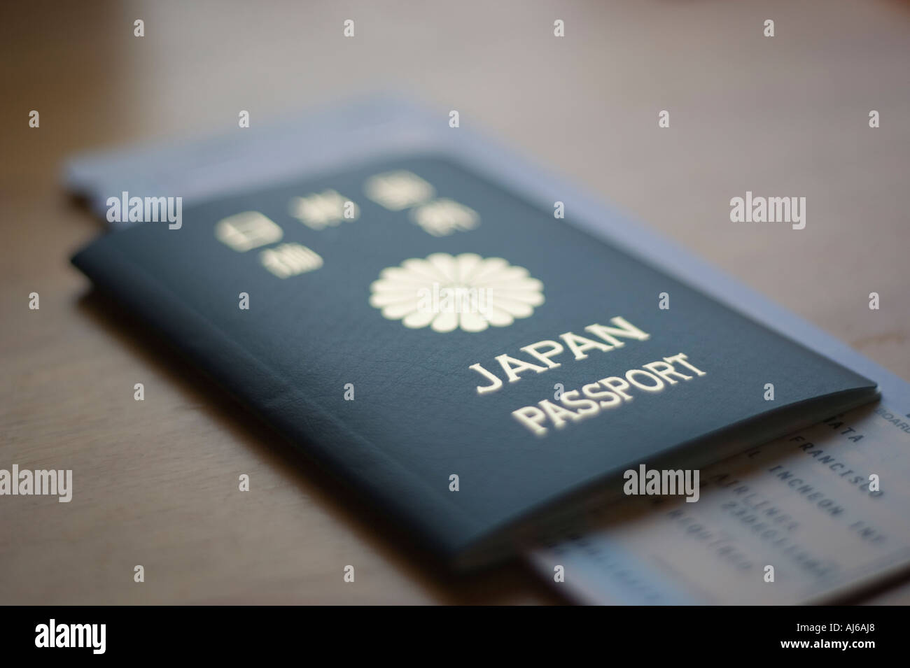 Japanese passport and airline ticket Stock Photo - Alamy