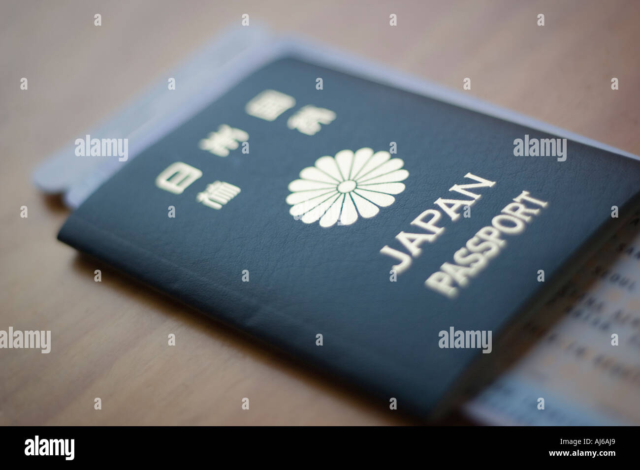 Japanese passport and airline ticket Stock Photo - Alamy