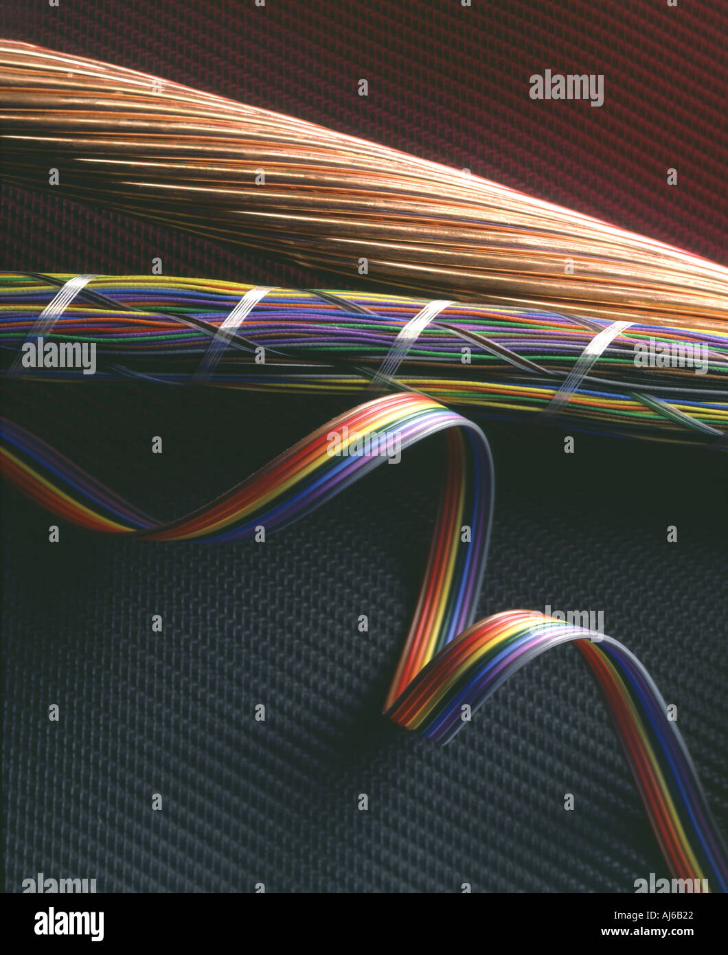 Copper ribbon and rainbow colored wire Stock Photo - Alamy