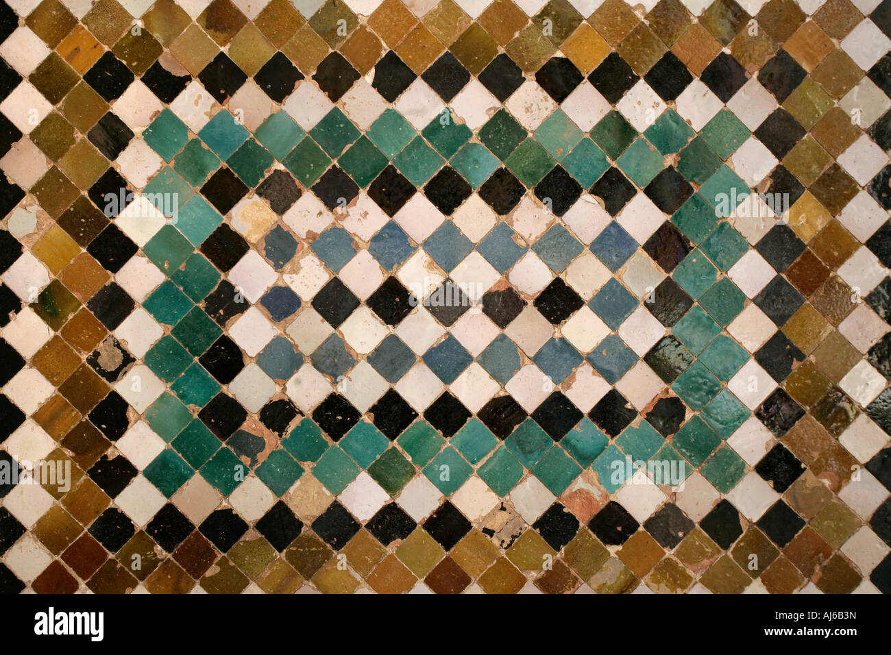 A tiled wall inside La Alhambra in Granada s old section Stock Photo ...