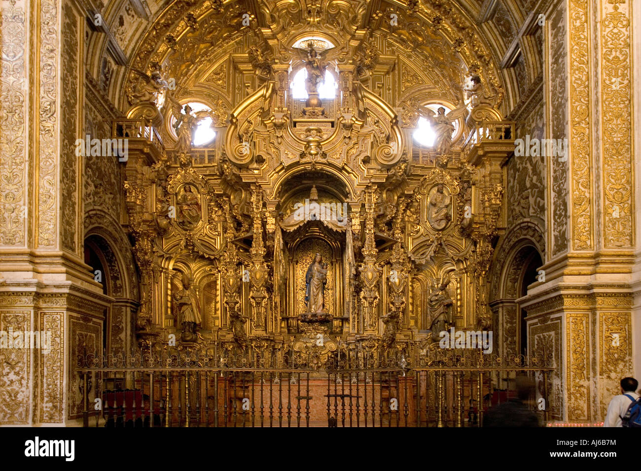 An elaborate golden alter inside the cathedral of Granada Cathedral of ...