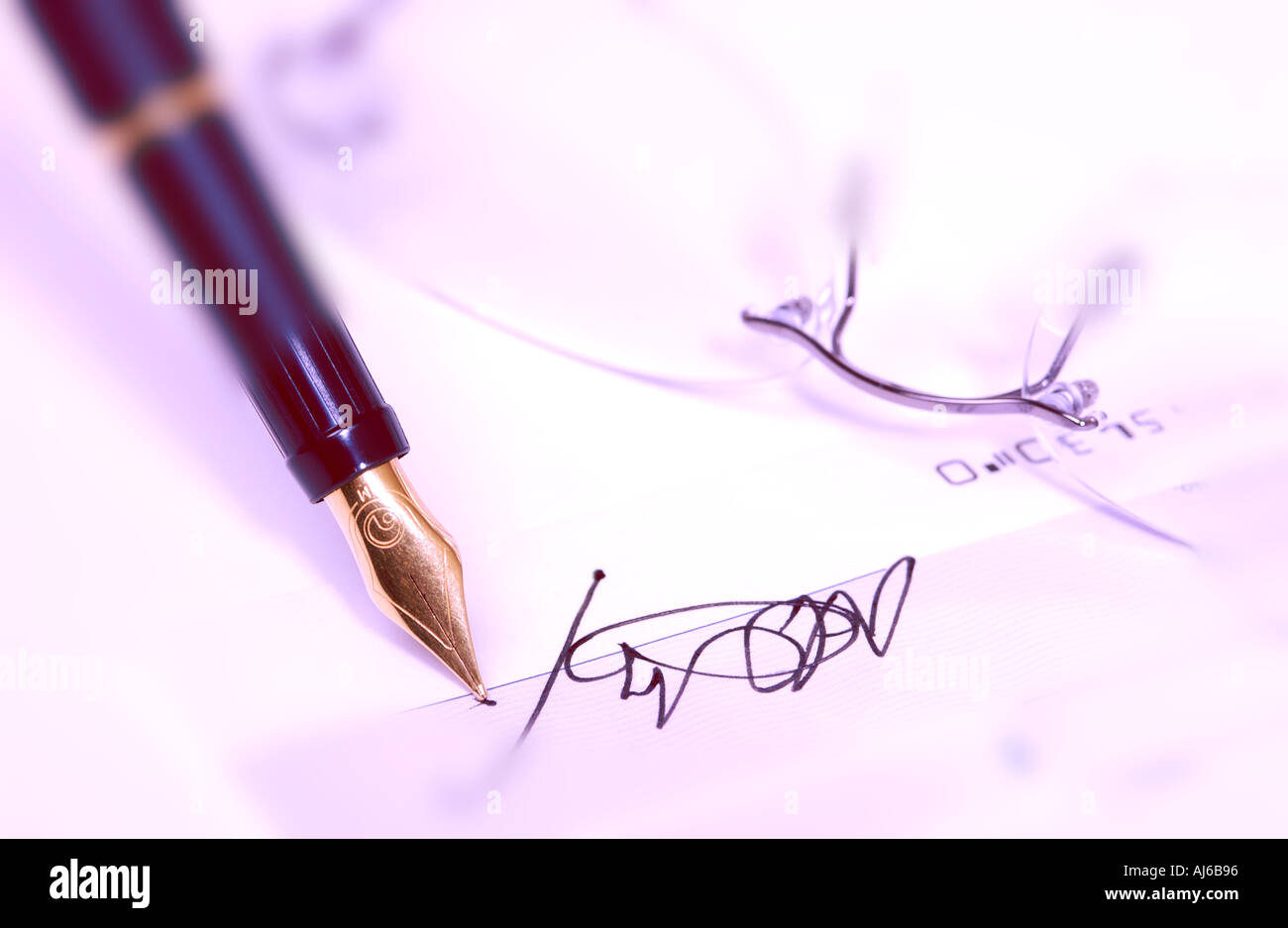 Cheque book pen signature hi-res stock photography and images - Alamy