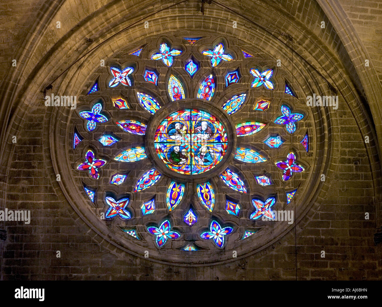 The impressive rose shaped stained glass window of the cathedral of ...