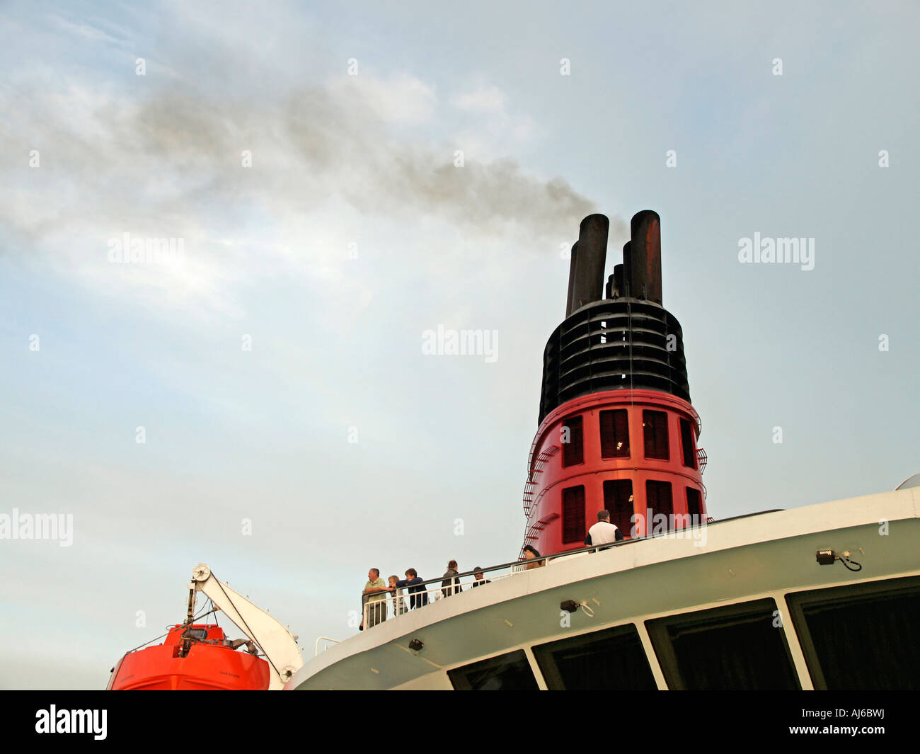 funnel of a ferry ship with exhaust gas noxious fumes Stock Photo - Alamy