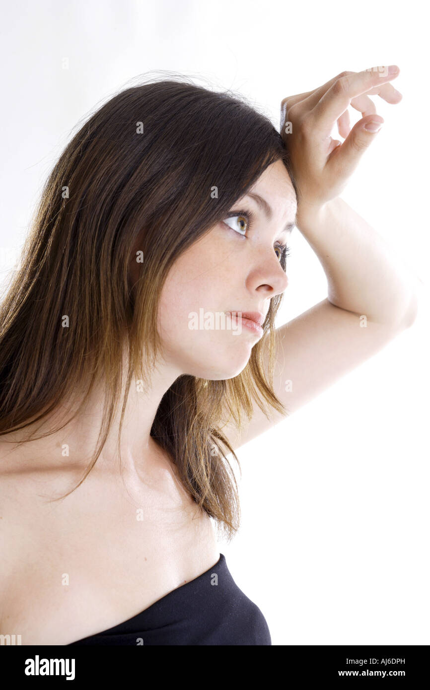 young woman pressing her hand on the head Stock Photo - Alamy