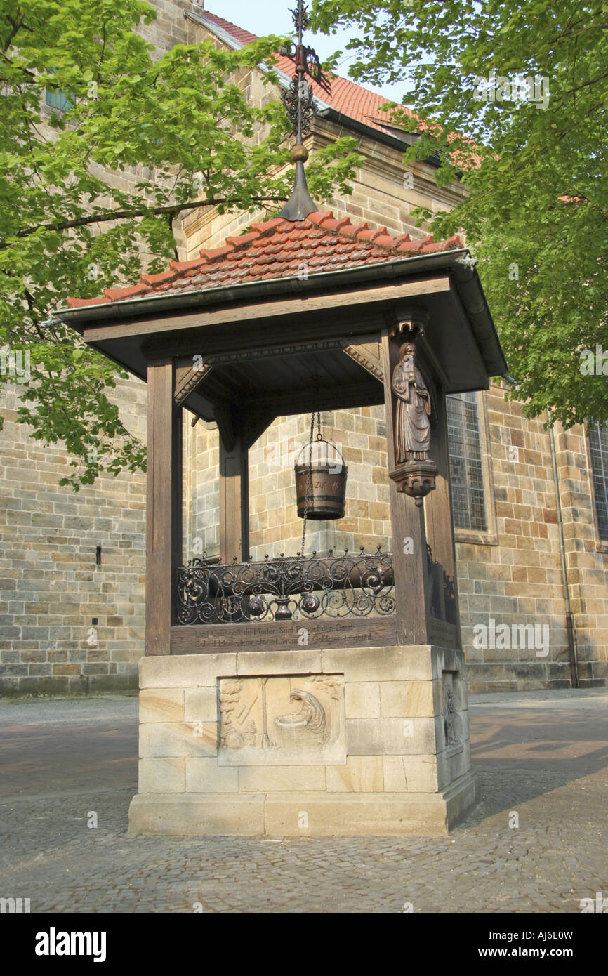 old village well on a church square, Germany, North Rhine-Westphalia ...