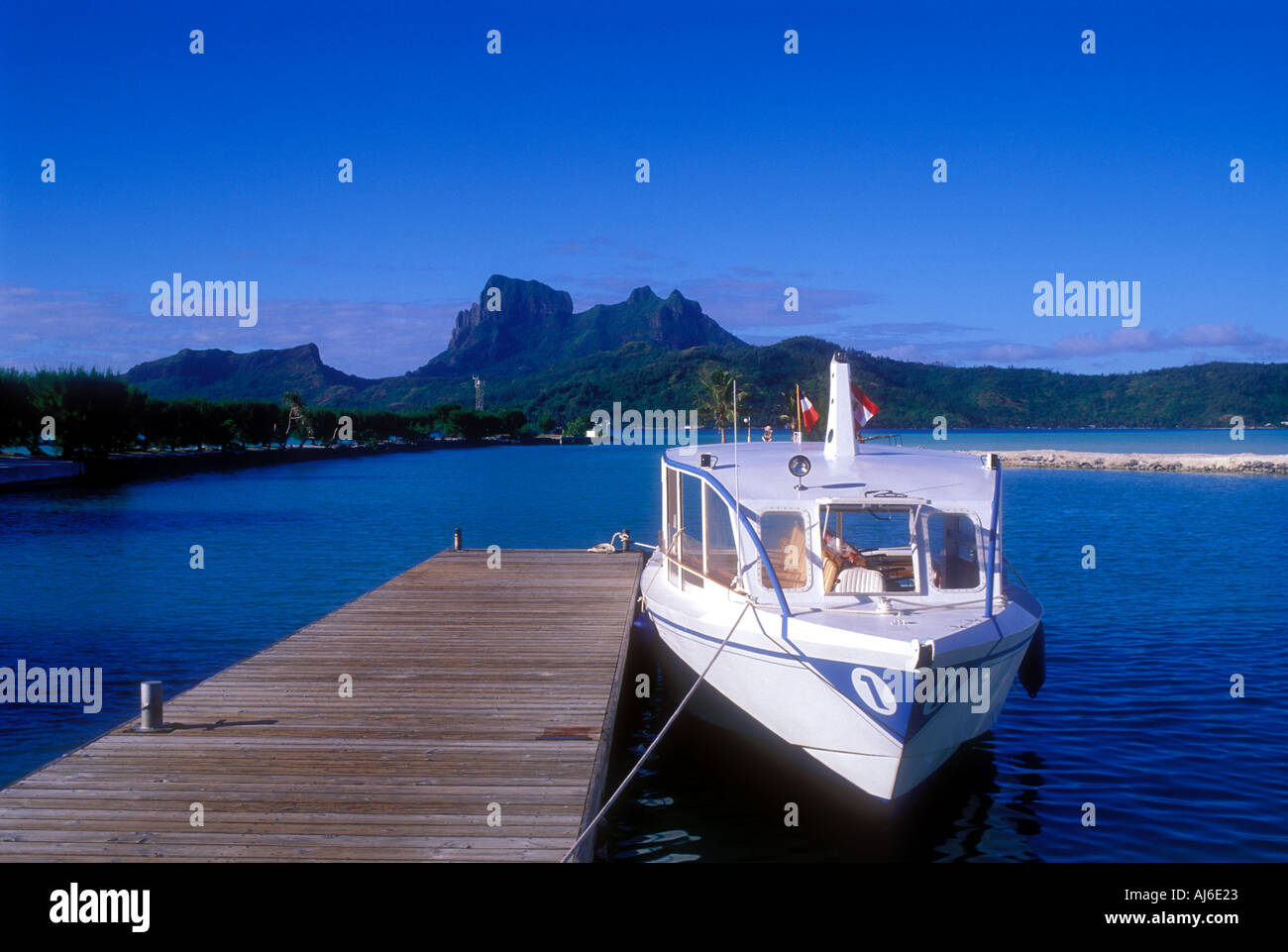 Airport public shuttle boat at dock on the island of Bora Bora in ...