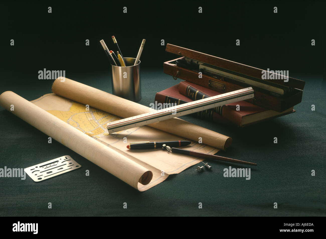 Desktop with map pens ruler drawing accessories Stock Photo - Alamy