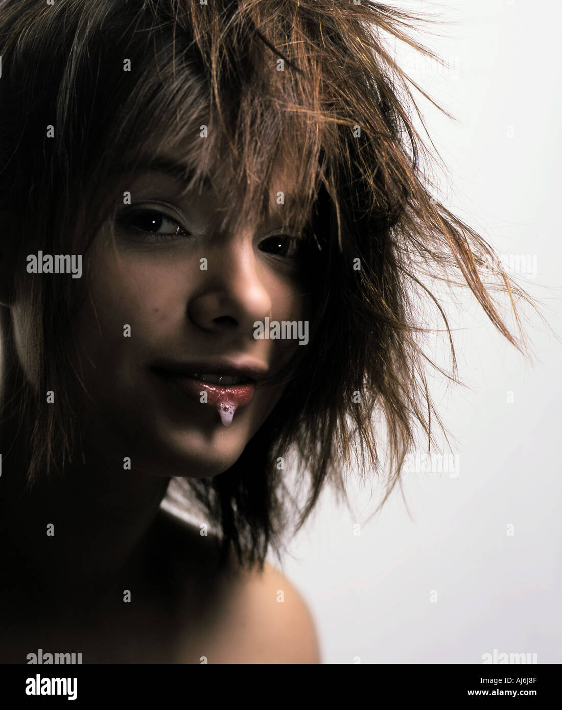 Young disheveled woman Stock Photo - Alamy