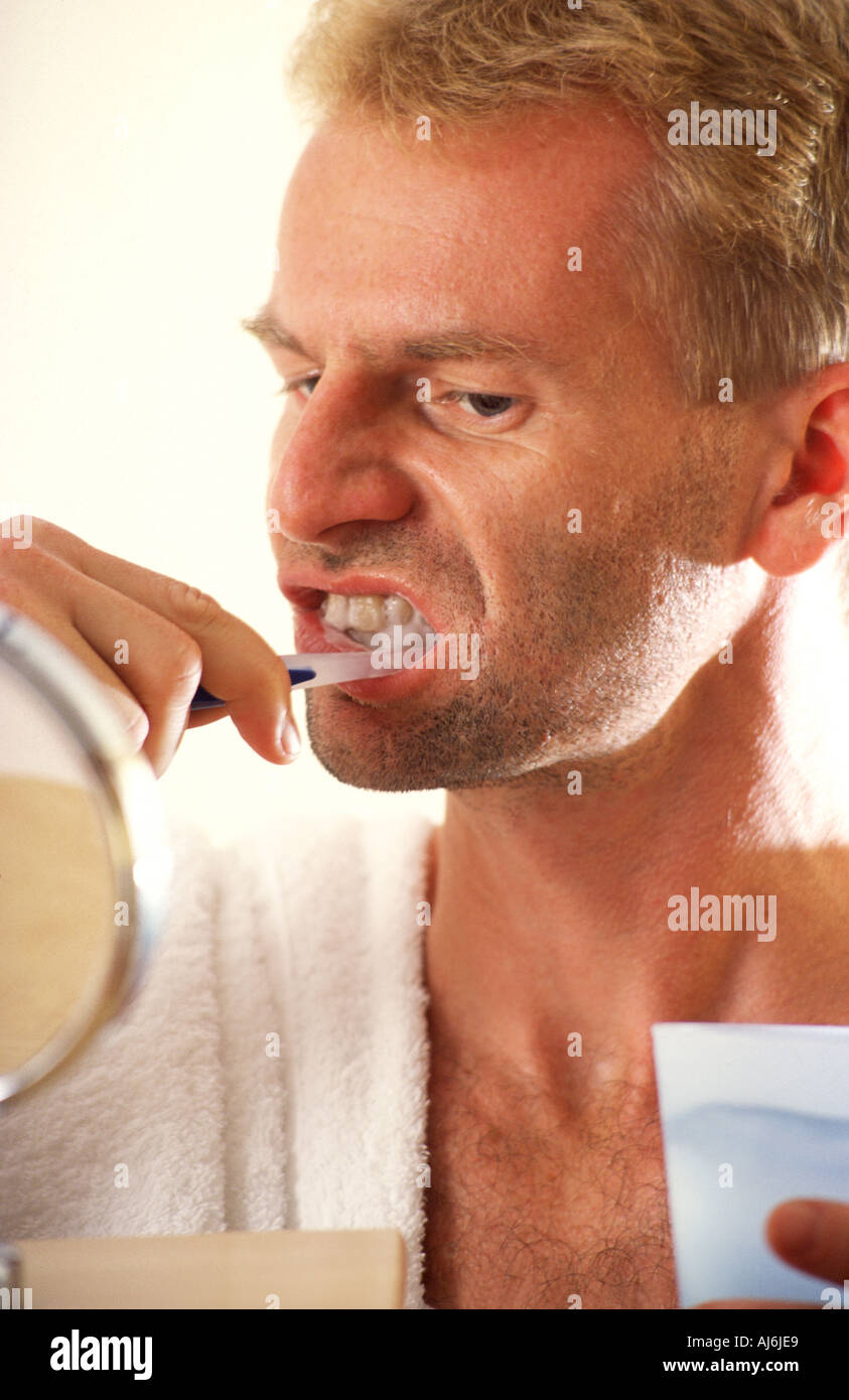 Man brushing his teeth Stock Photo - Alamy