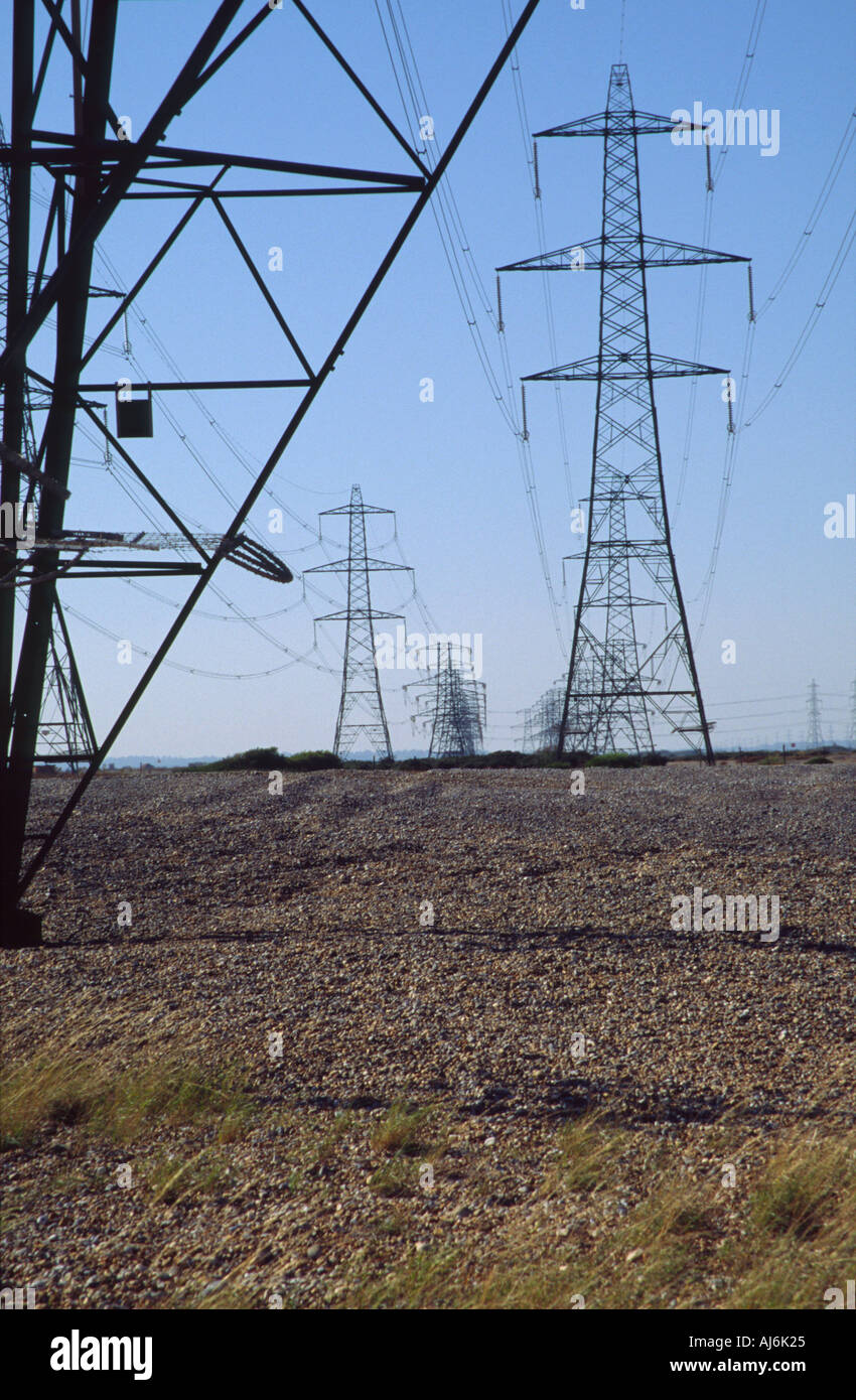 View of Pylons leading from Dungeness Power Station West Sussex England ...