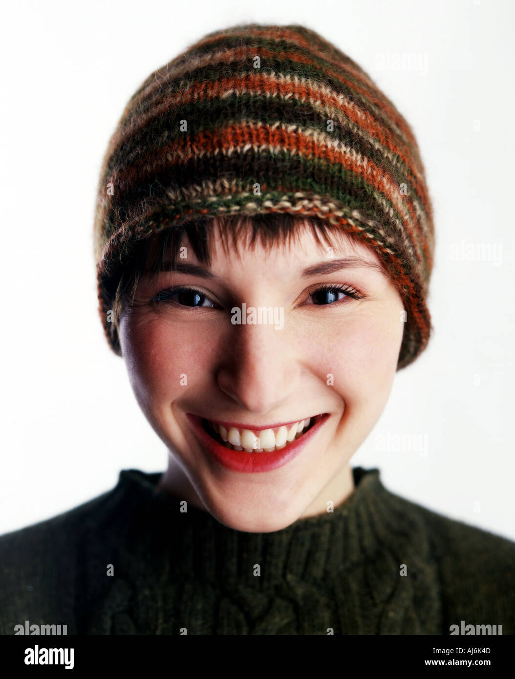 Young woman woolly hat smile hi-res stock photography and images - Alamy