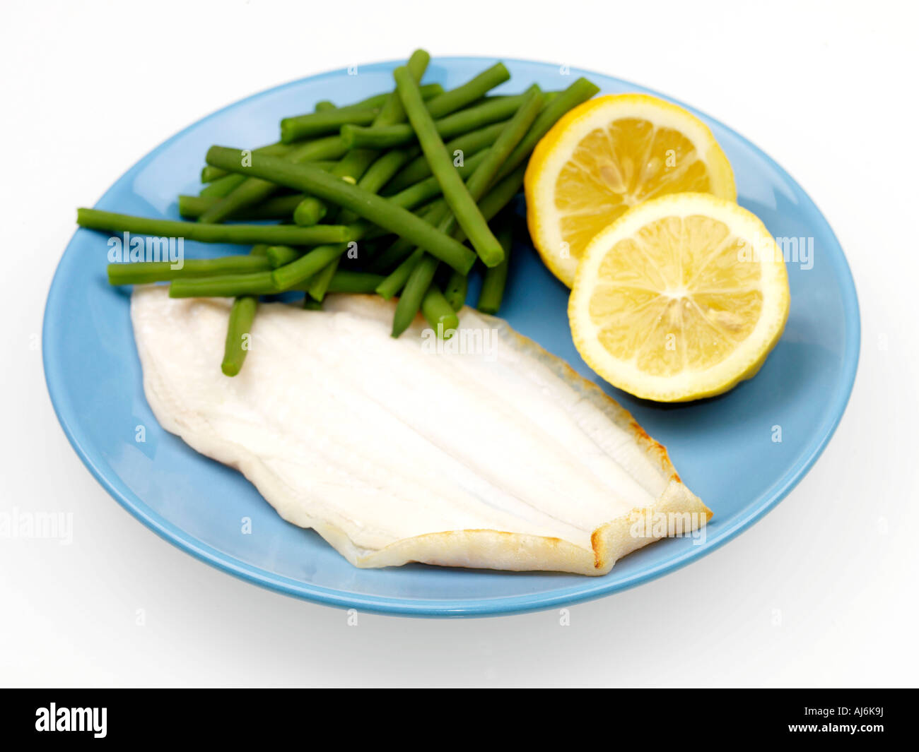 Gently Poached Fresh Healthy Fillet Of Lemon Sole Flat Fish With Green ...