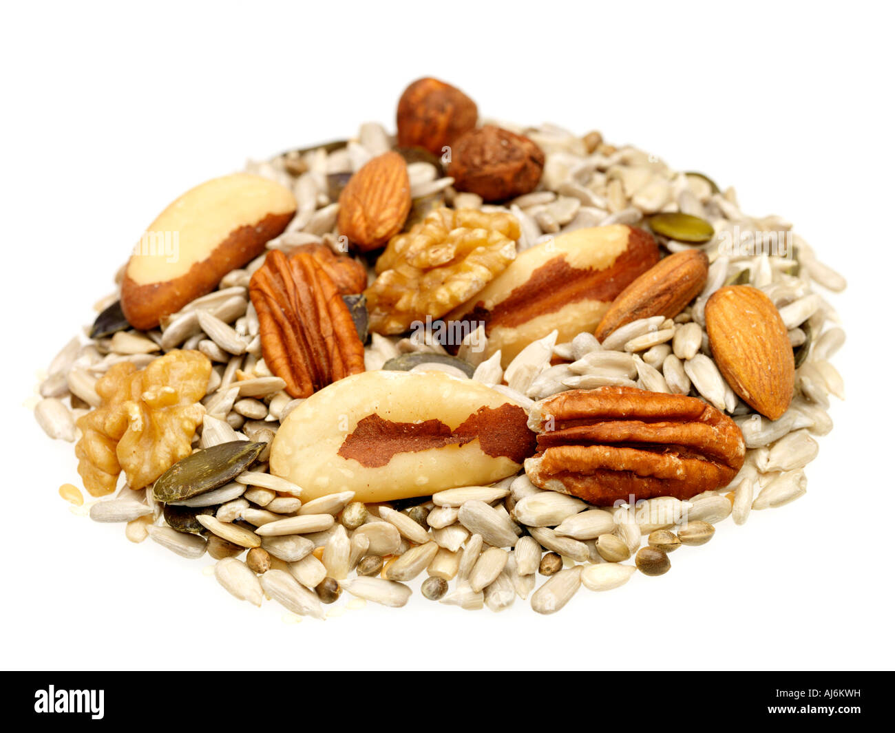 Selection Of Healthy Dried Nuts And Seeds Isolated Against A White ...
