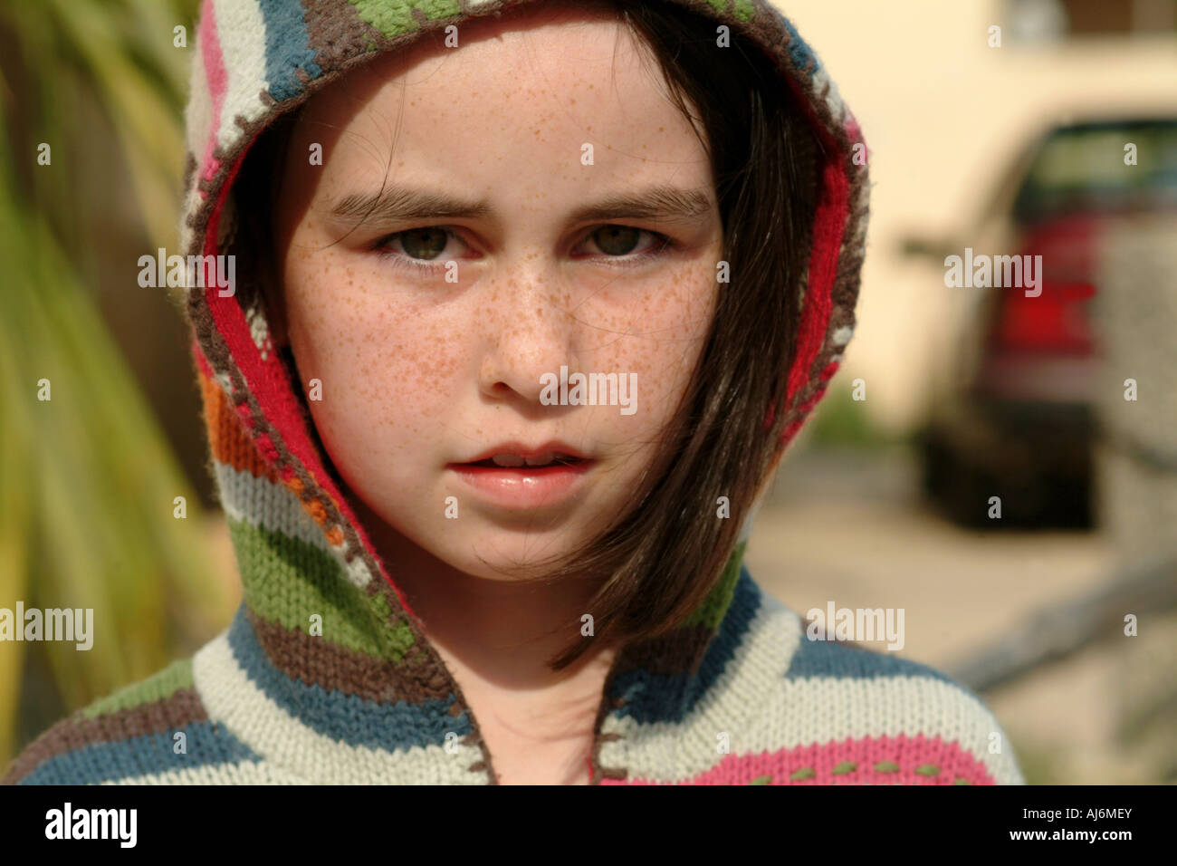 A pretty girl looks serious Stock Photo - Alamy