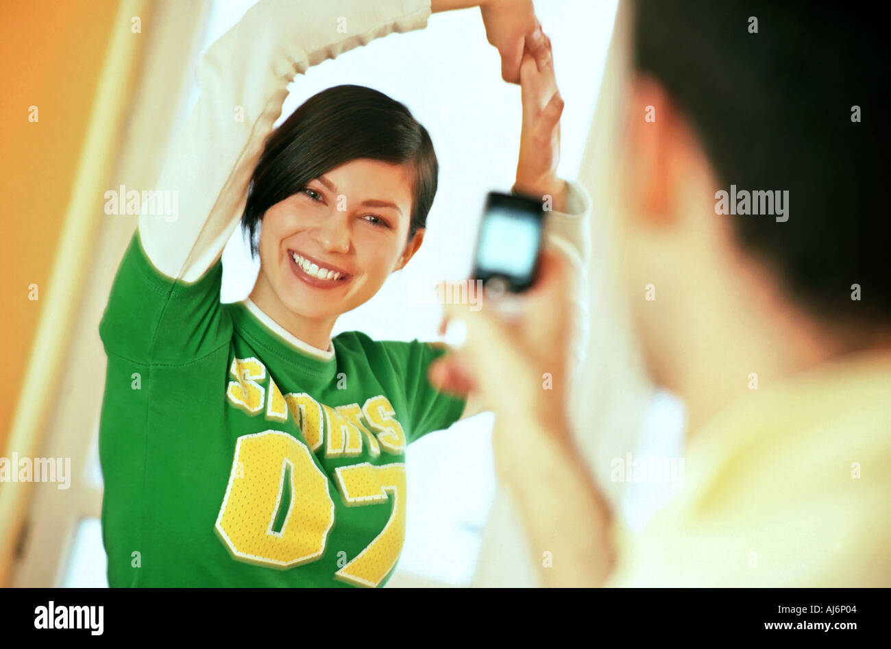 indoor flat room woman girl man boy 20 25 young pair couple brunette ...