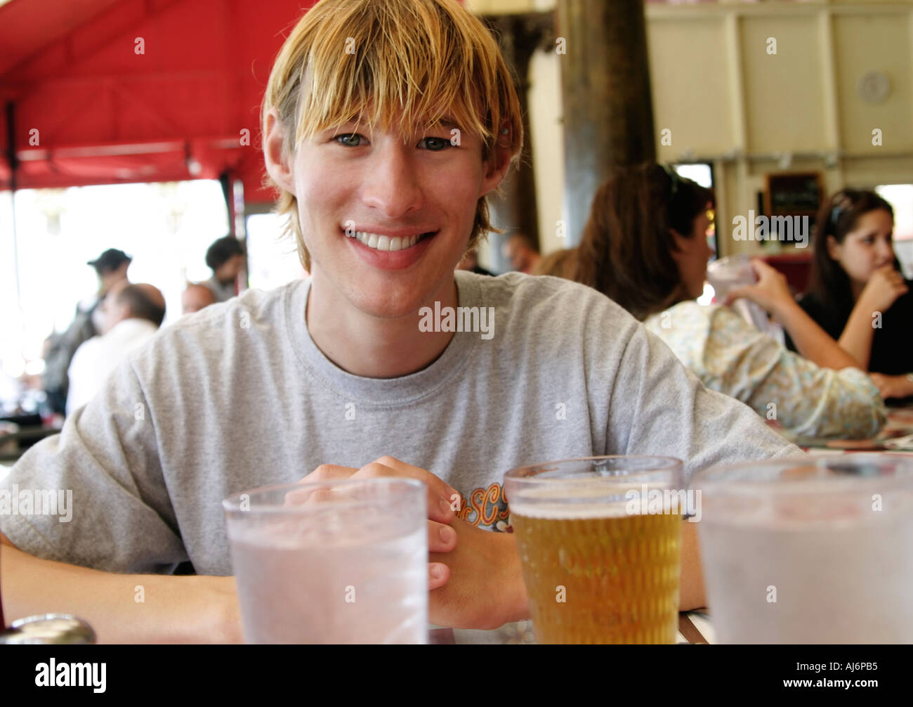 Drinking beer crossed arms not german hi-res stock photography and ...