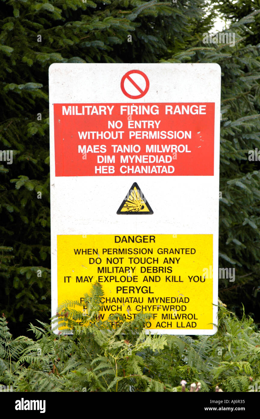 Bilingual warning notice at the entrance to a MILITARY FIRING RANGE ...