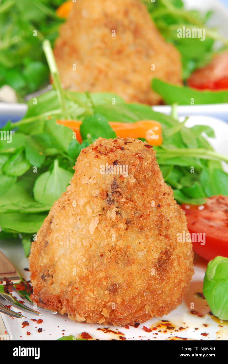 Canapes of fried mushroom arancini and salad Stock Photo - Alamy