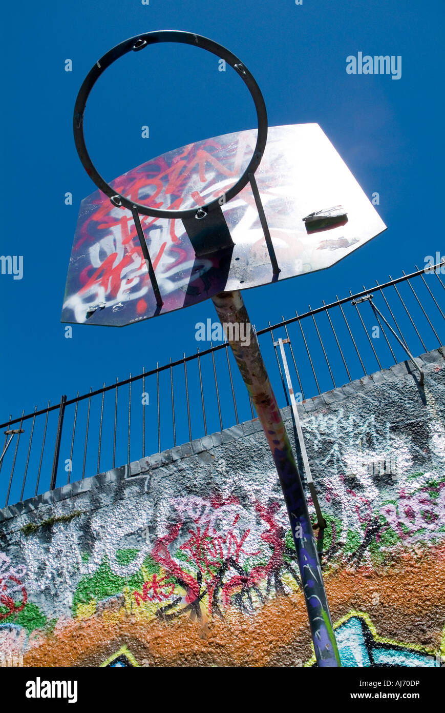 Graffiti on a wall and basketball hoop, Tarner Park, Brighton, Sussex ...