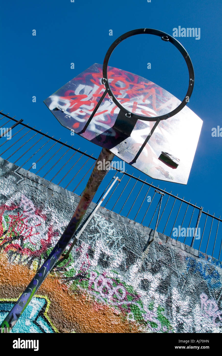 Graffiti on a wall and basketball hoop at Tarner Park, Brighton ...