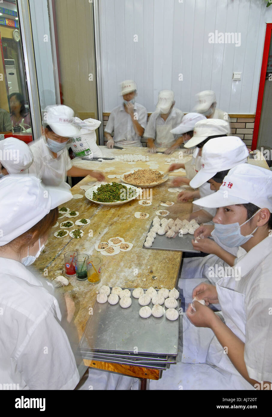 Preparing Food in a Beijing Chinese Restaurant Kitchen Stock Photo - Alamy