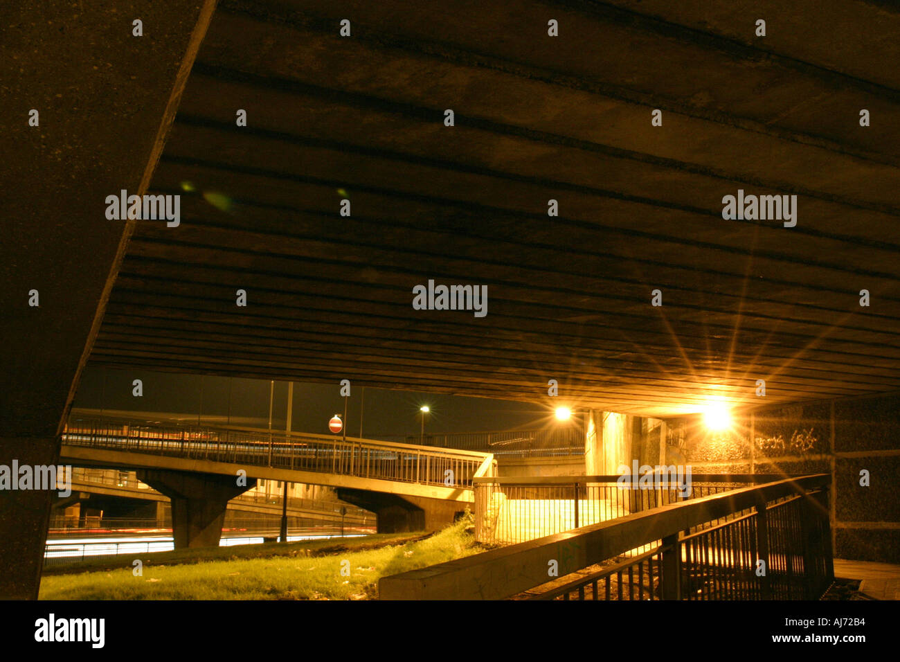 Urban Motorway walkway and footbridge at night Stock Photo - Alamy