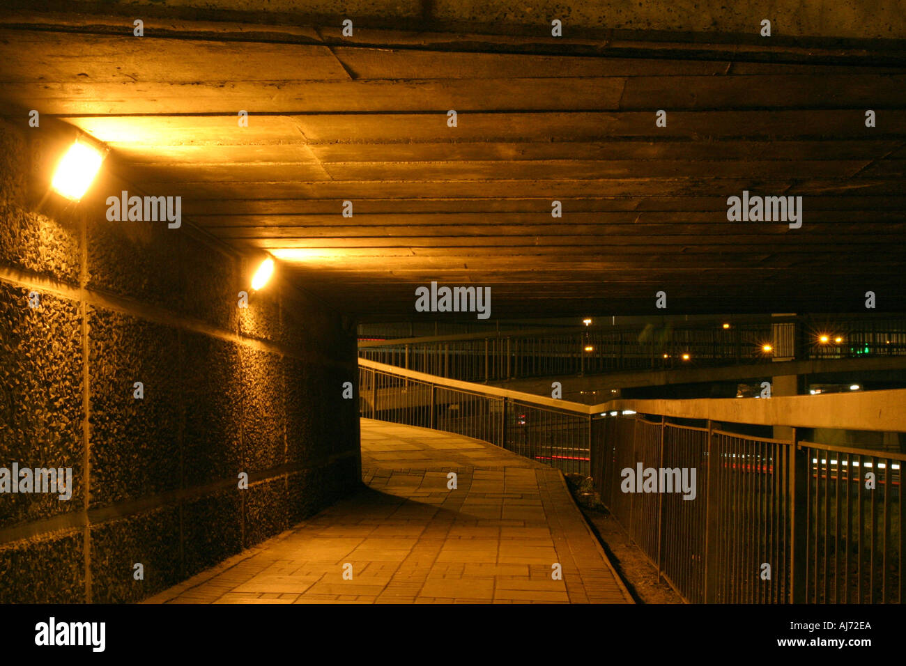 Urban Motorway walkway and footbridge at night Stock Photo - Alamy