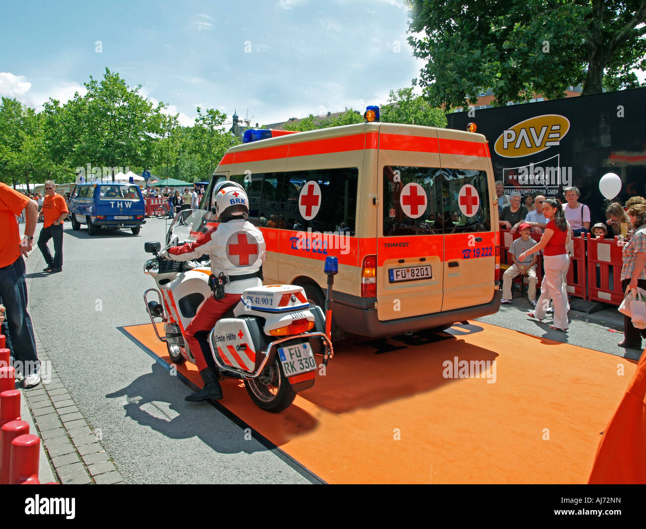 first aid motorcycle and ambulance car of German red cross in an event ...