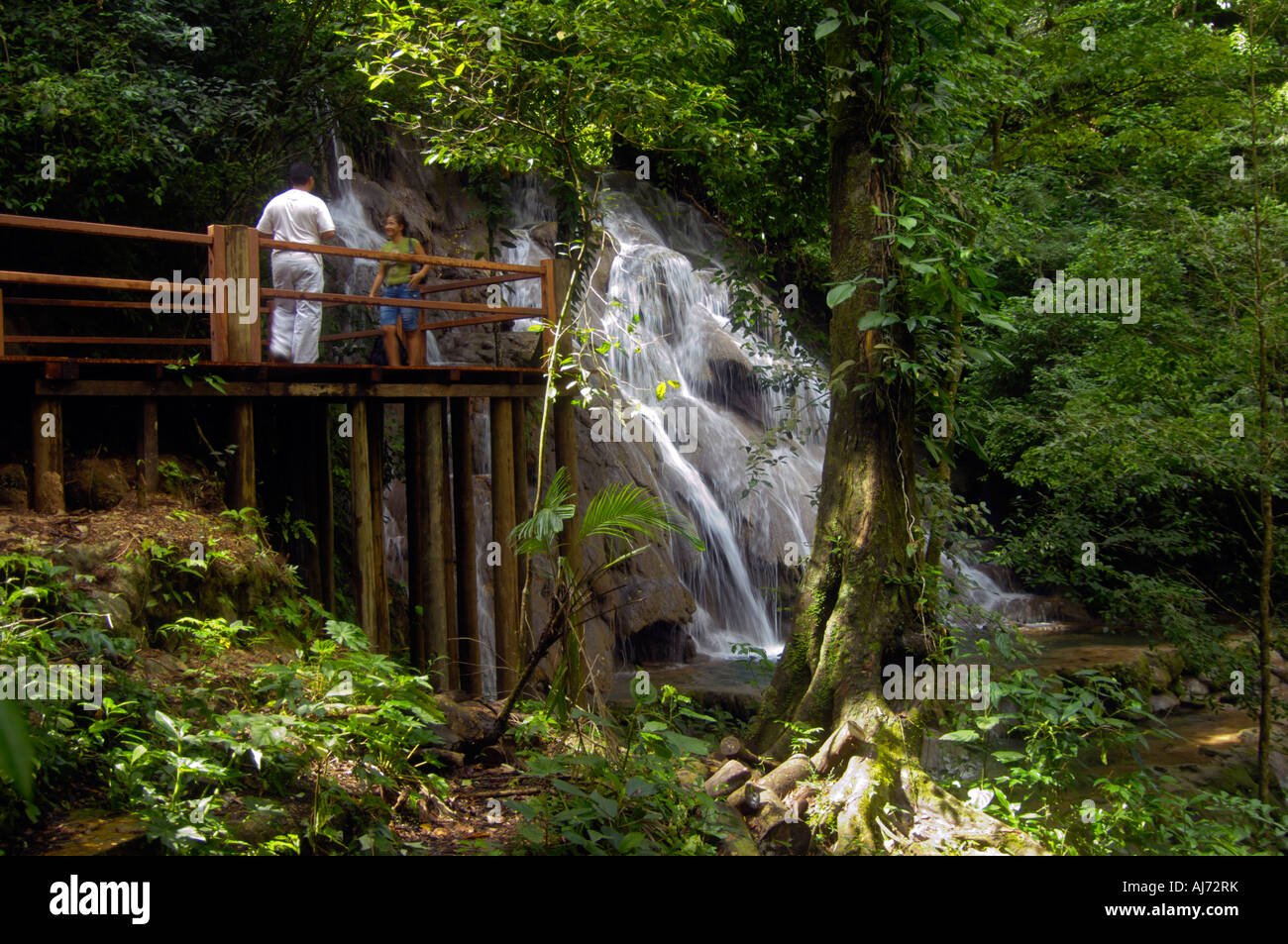A couple by a waterfall in the Parque Nacional Palenque Stock Photo - Alamy