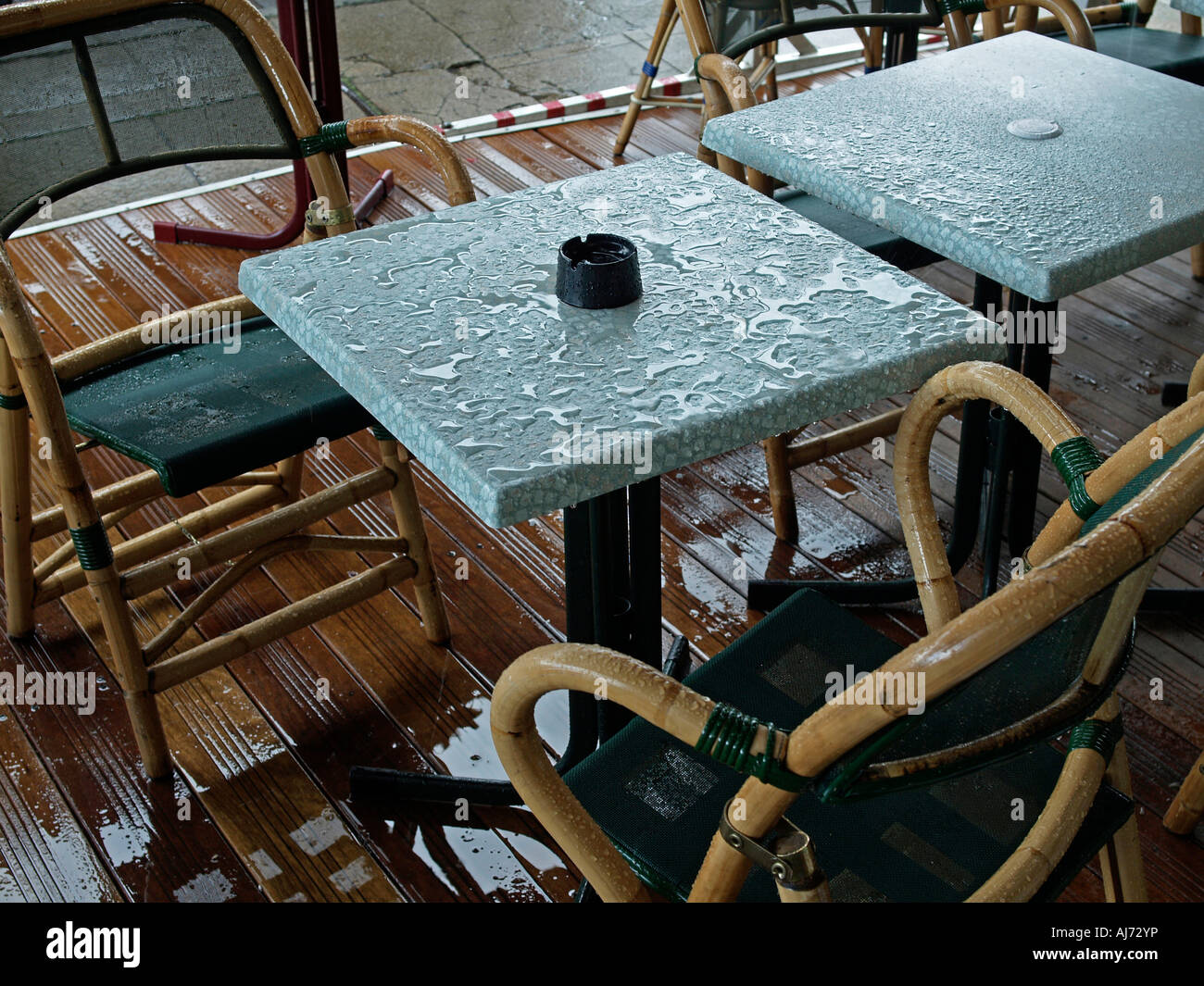 Empty outdoor cafe on rainy hi-res stock photography and images - Alamy