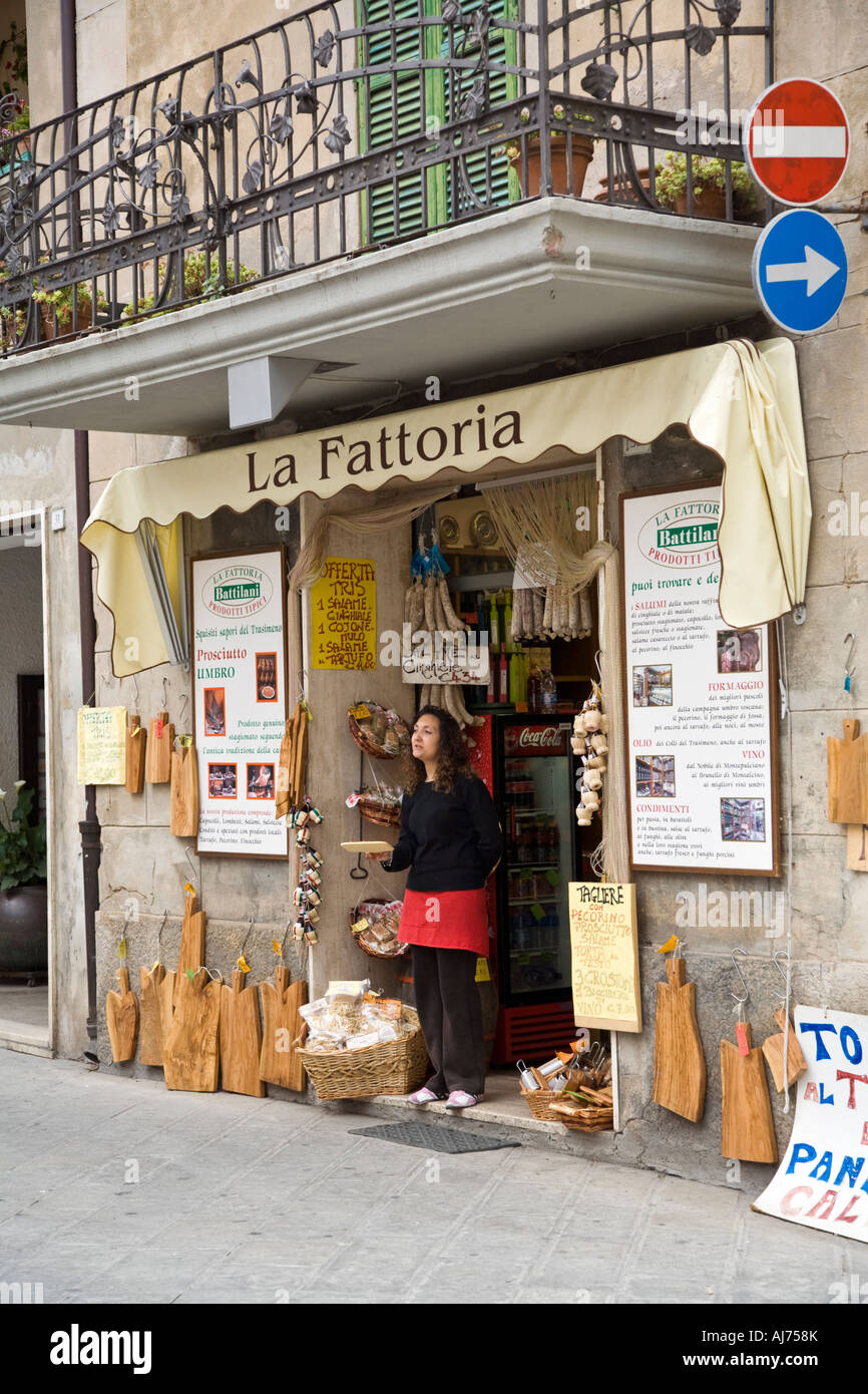 Shopkeeper offers samples of typical regional food products tourist ...
